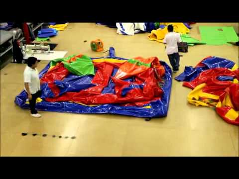 How to roll commercial bounce house - YouTube