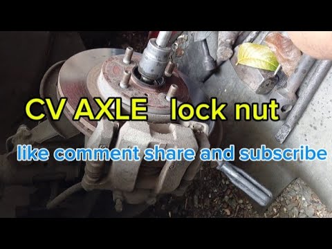 removing the stock lock nut from the CV axle." - YouTube