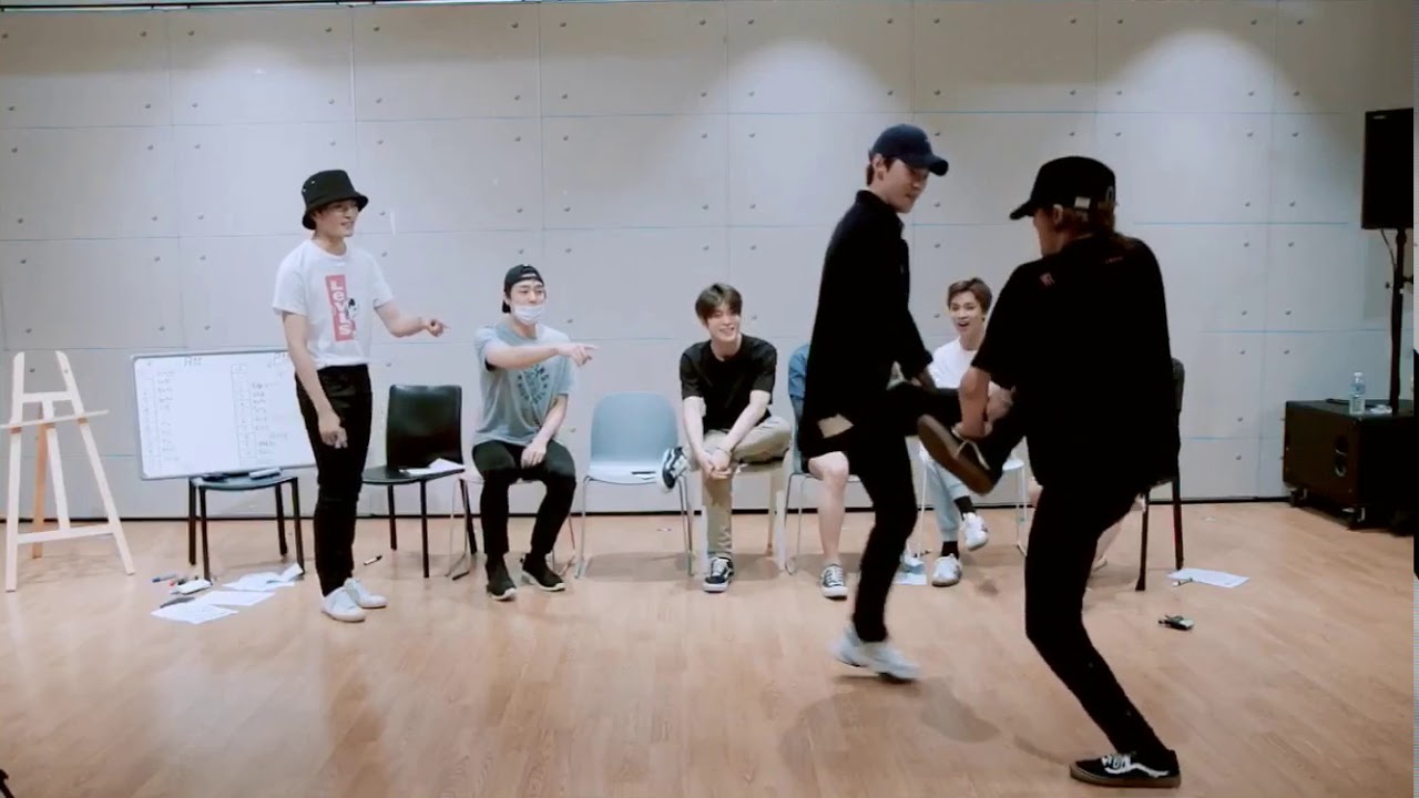 yuta and doyoung playing the leg fight game - YouTube