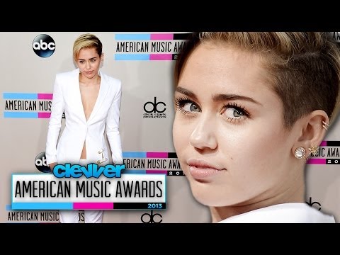 Miley Cyrus Glows in White Pant Suit at American Music Awards 2013