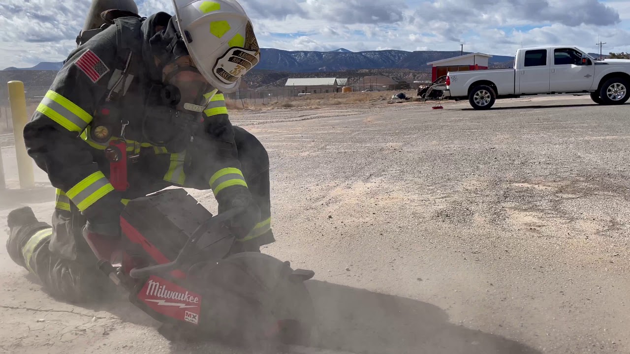 Using Milwaukee Rescue Saw in full PPE - YouTube