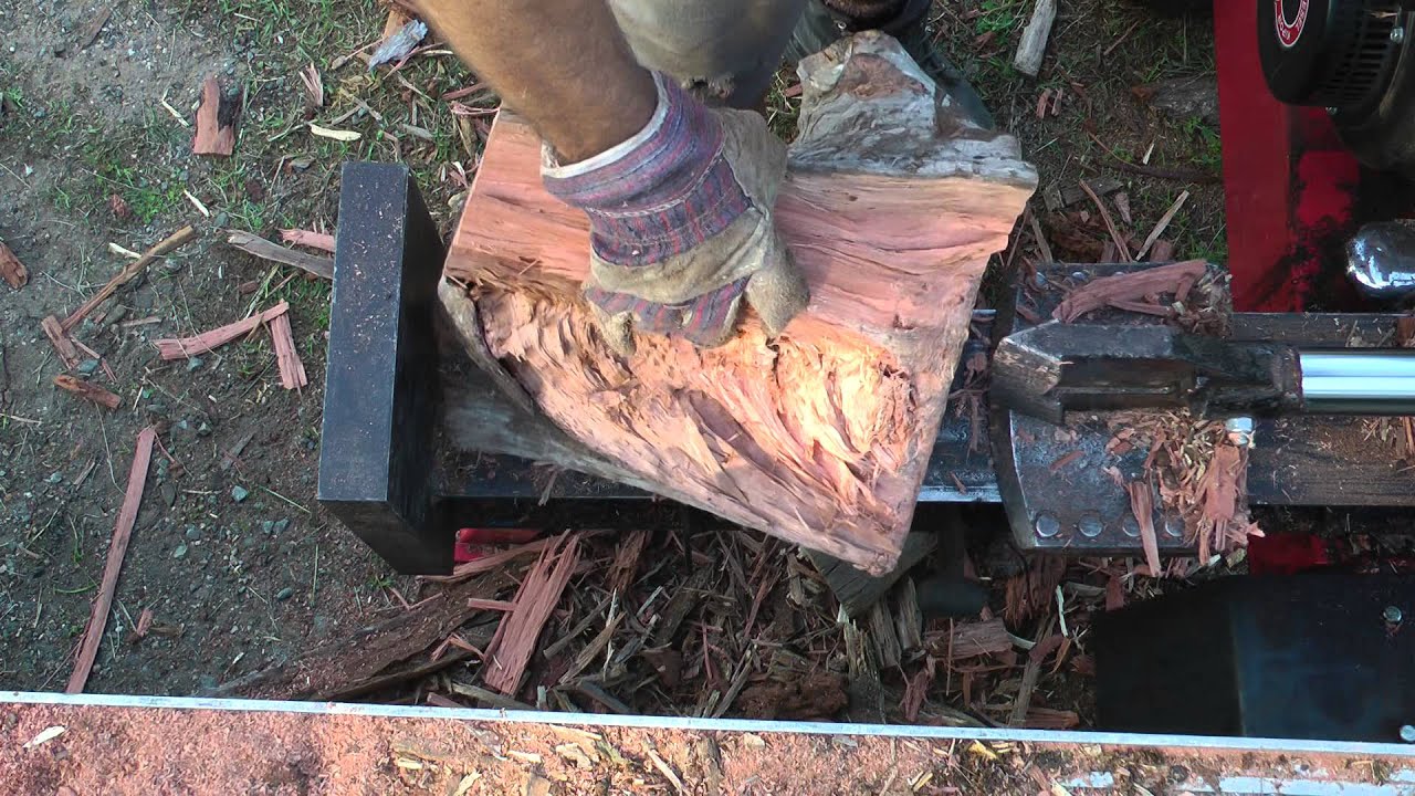 Splitting wood - YouTube