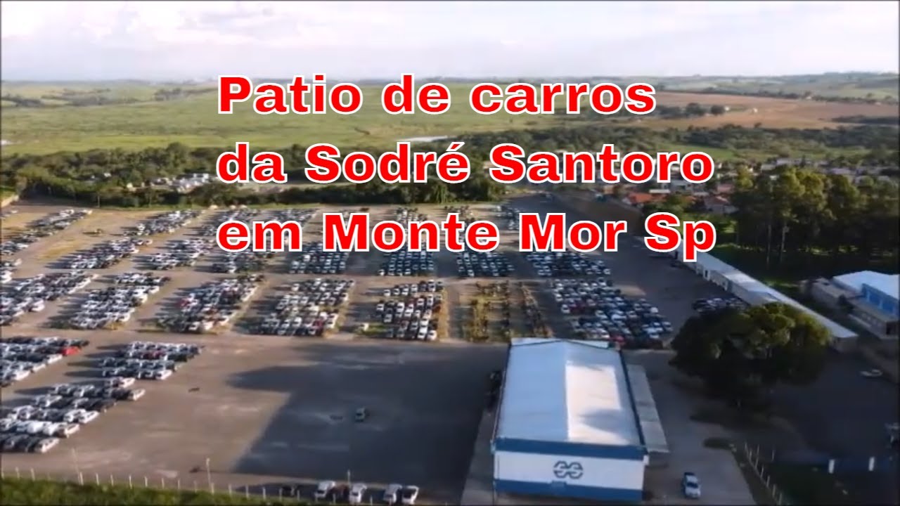 Explorando Monte mor SP do alto drone sobrevoa pátio de carros ...
