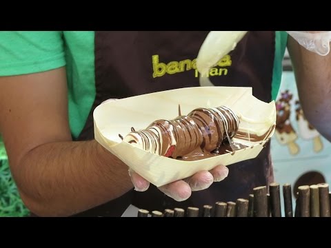 London Street Food. Super Dessert. Banana Strawberry with Three Chocolates