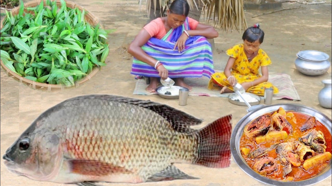 santali tribe mother cooking fish curry & kule khara shak recipe for ...