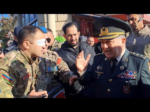 Əlil qazi yaltaq polkovniki biabır etdi. Maşına minib qaçdı