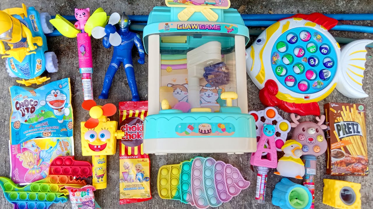 Permen yupi lolipop hello Kitty pop it es krim Minion Choki Upin Ipin ...