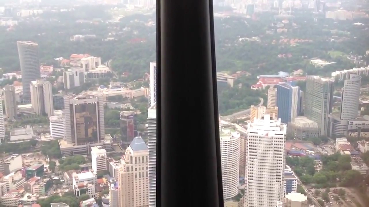 KL Tower restaurant 360 hi tea - YouTube
