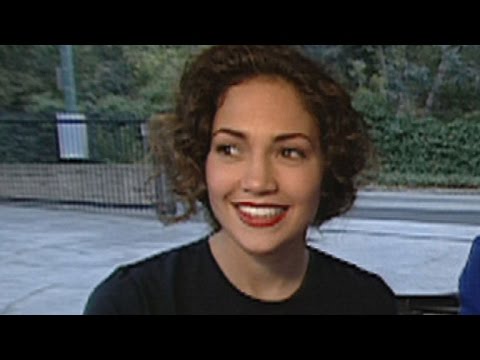 John Tesh Hilariously Crashes Jennifer Lopez's First ET Interview... On a Motorcycle.