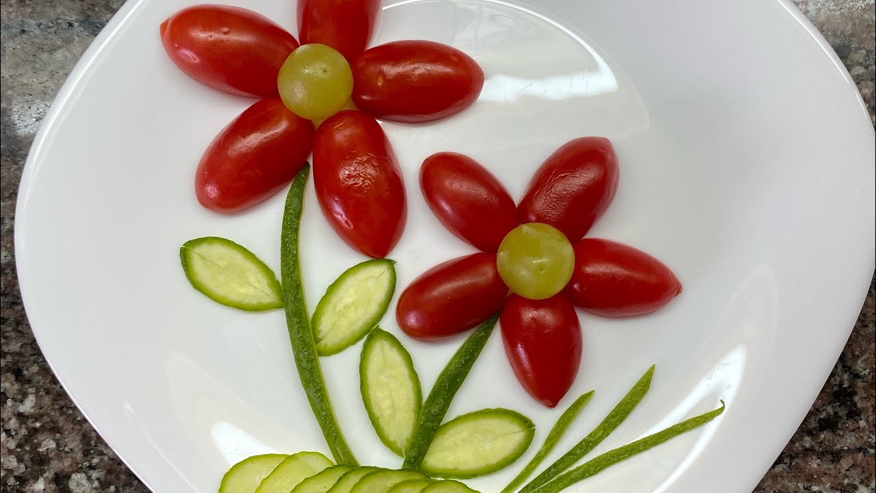 Beautiful flower of tomatoes carving garnish and food art food ...