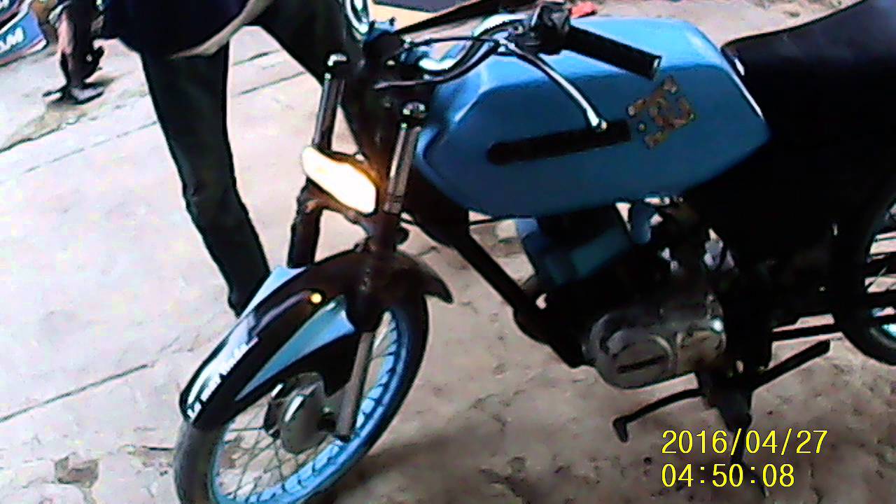 Suzuki ax 100 escape a medida y algunas modificaciones - YouTube