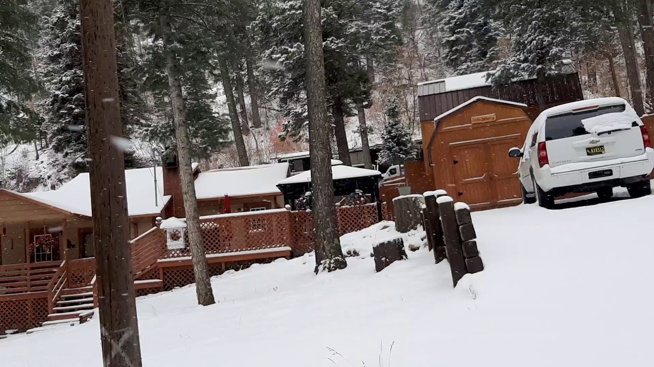 Beautiful snowy Ruidoso New Mexico. Main Street in Upper Canyon ...