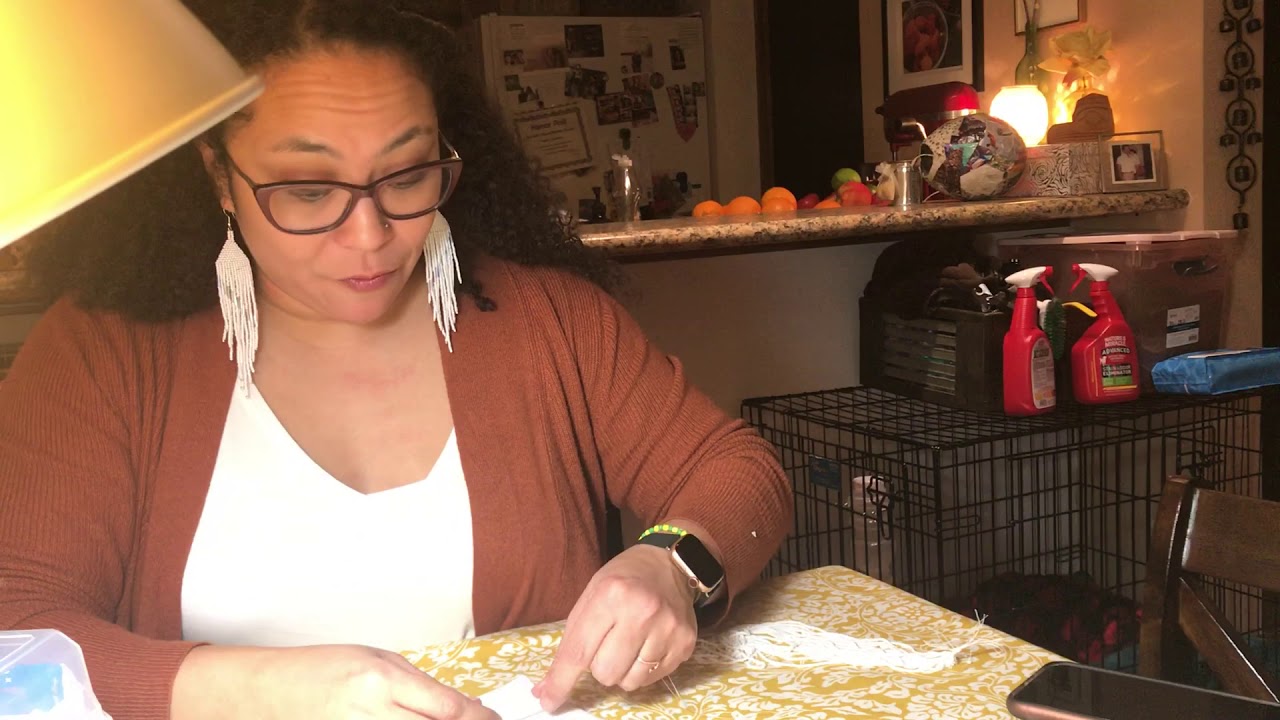 Juneau artist talks while she beads - YouTube