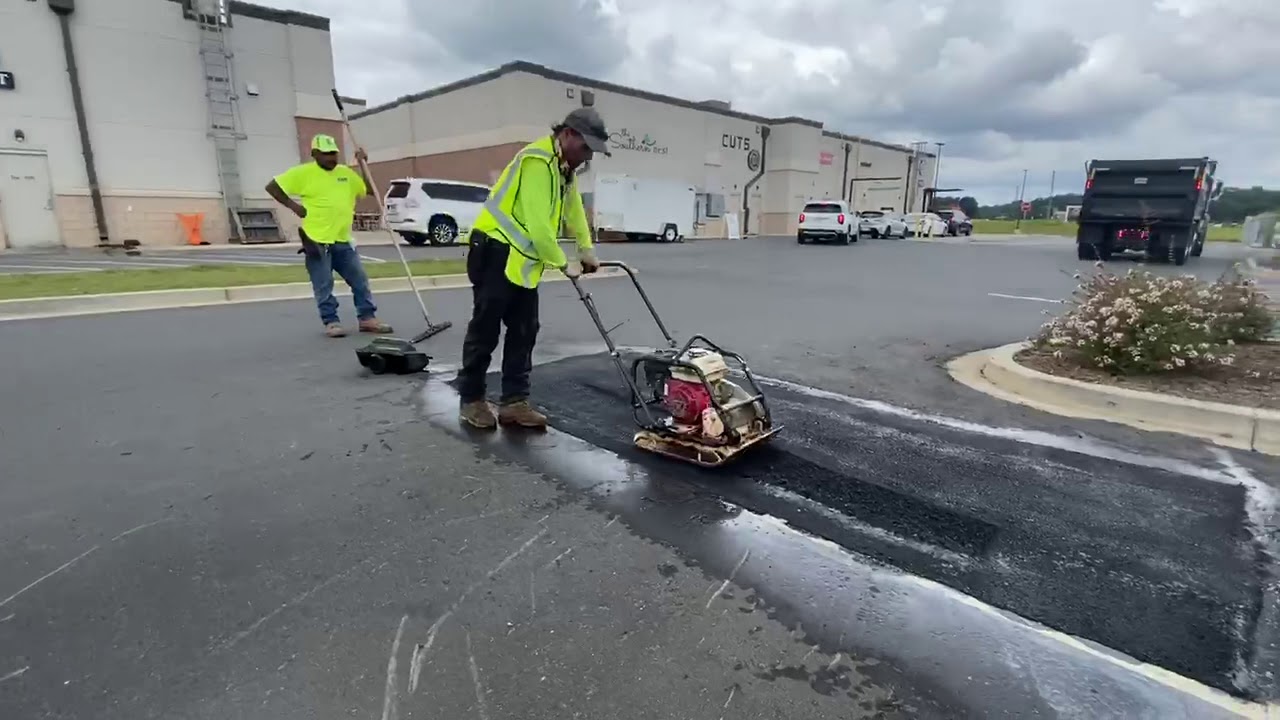 Small asphalt pavement patch - SMI PAVING - YouTube