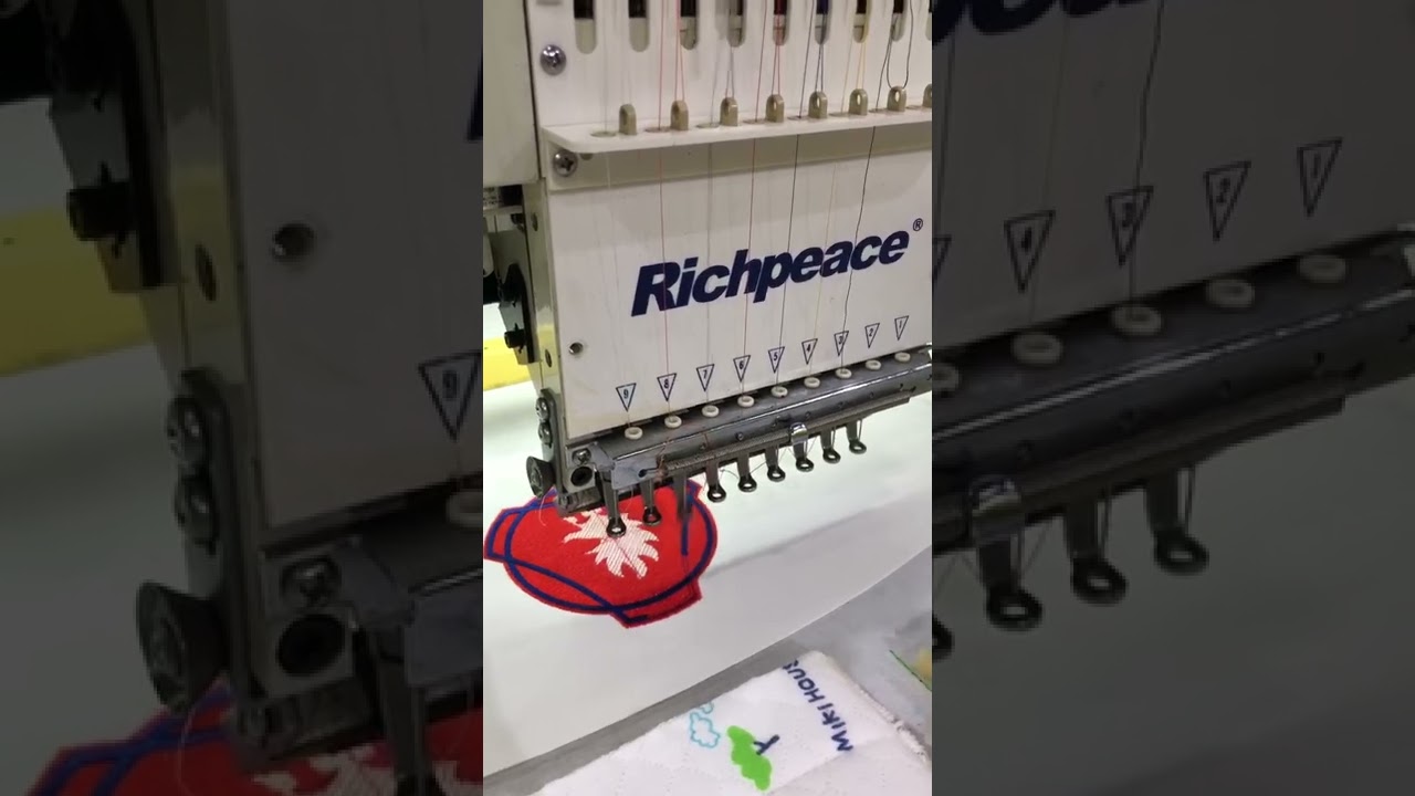 Stitching/Sewing/Embroidery/Quilting machine is doing testing for logos ...