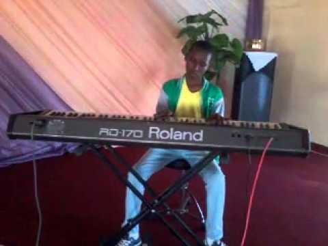 Lingani playing keyboard.... NTATE KE MANG