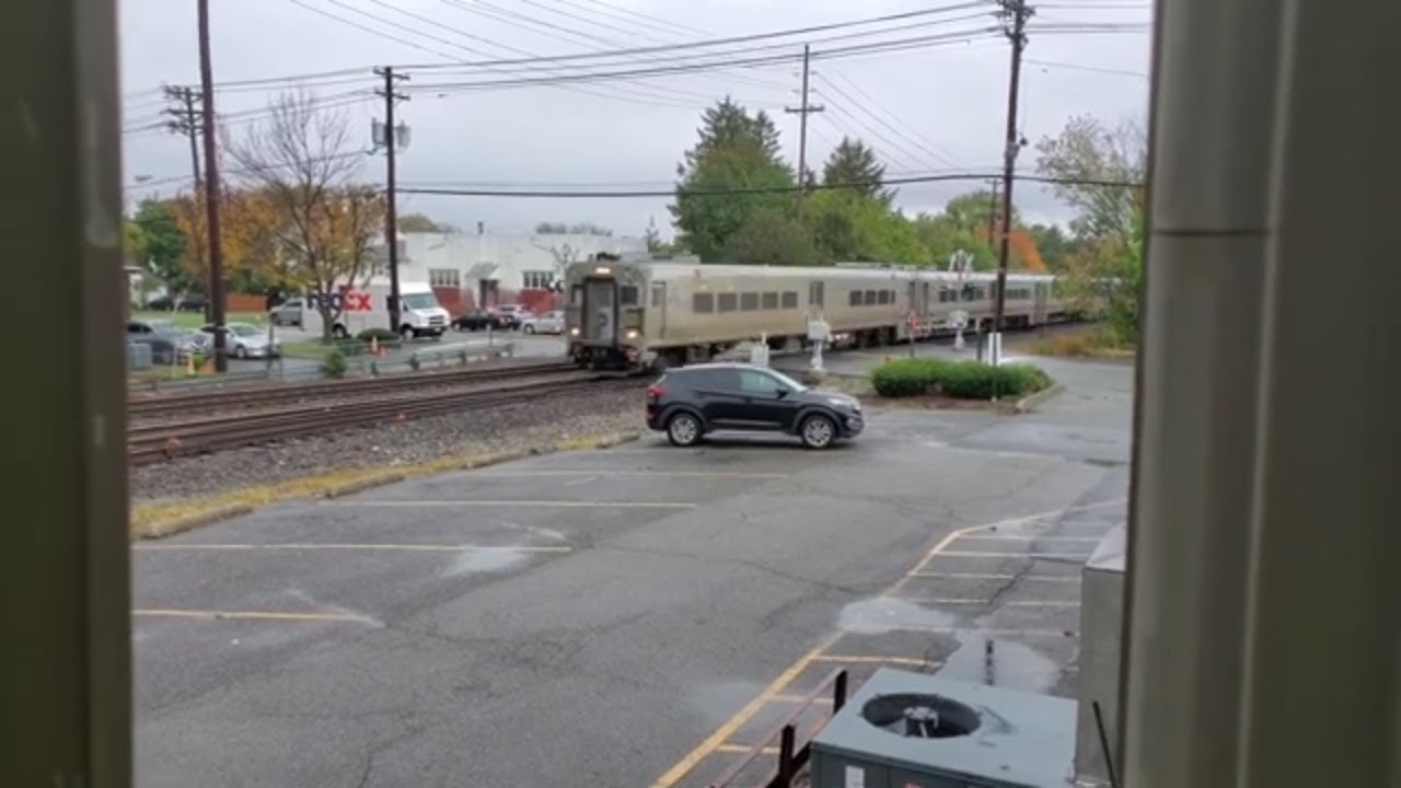 NJ Transit Trains at Morlot Avenue Railroad Crossing - YouTube