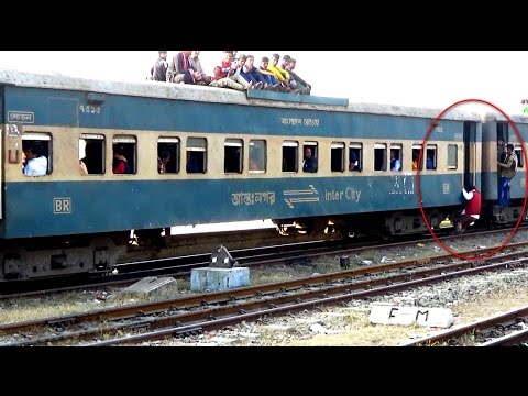 Passengers are dangerously fallen from running train / Must see it ...