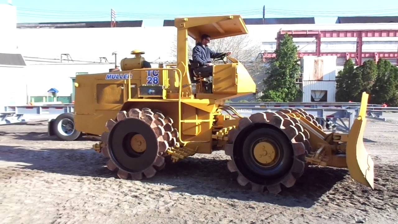 Muller TC28 Soil Compactor with Dozer Blade - EquipSeller Heavy ...