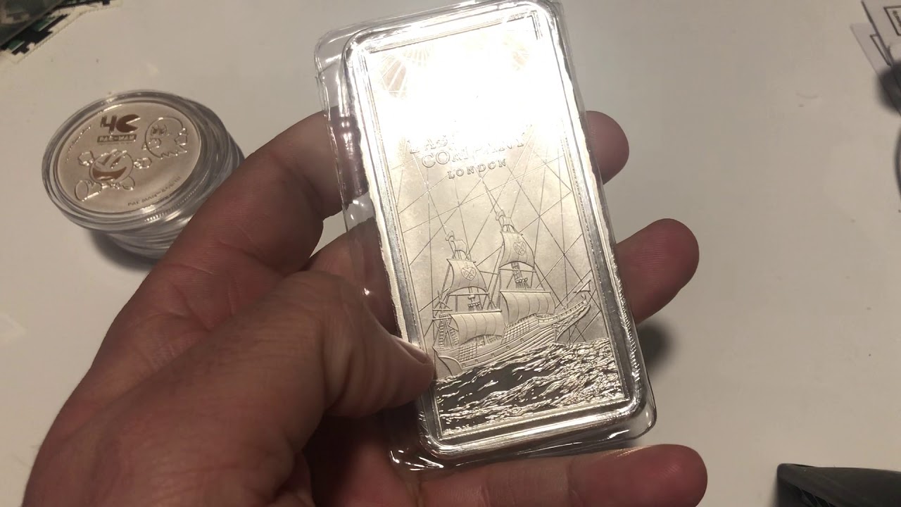 silver coins and a silver coin bar - YouTube