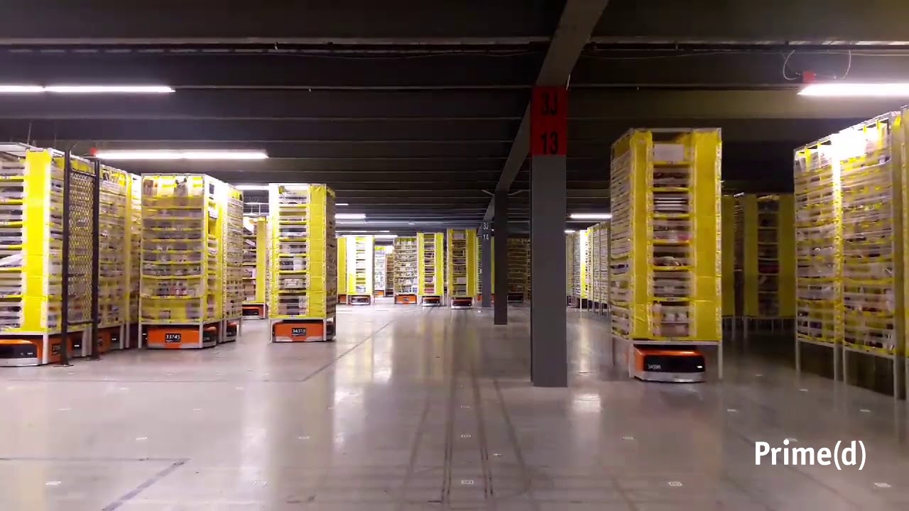 Amazon robots dancing in a Kent warehouse - YouTube
