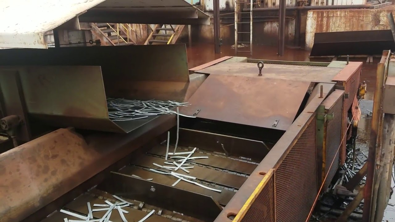 Shuffle Conveyor Handling Slitter/Chopper Scrap - YouTube