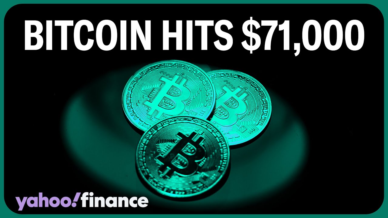 Bitcoin soars to record high of $71K - YouTube