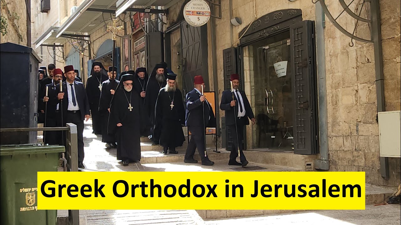 During Holy Week, the Eastern Orthodox procession enters the Church of ...