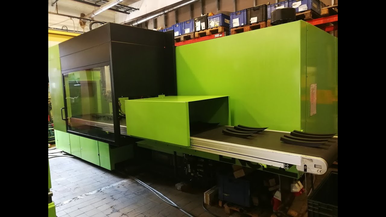 Robot on Engel VC 1350 220 Tech injection moulding machine - YouTube