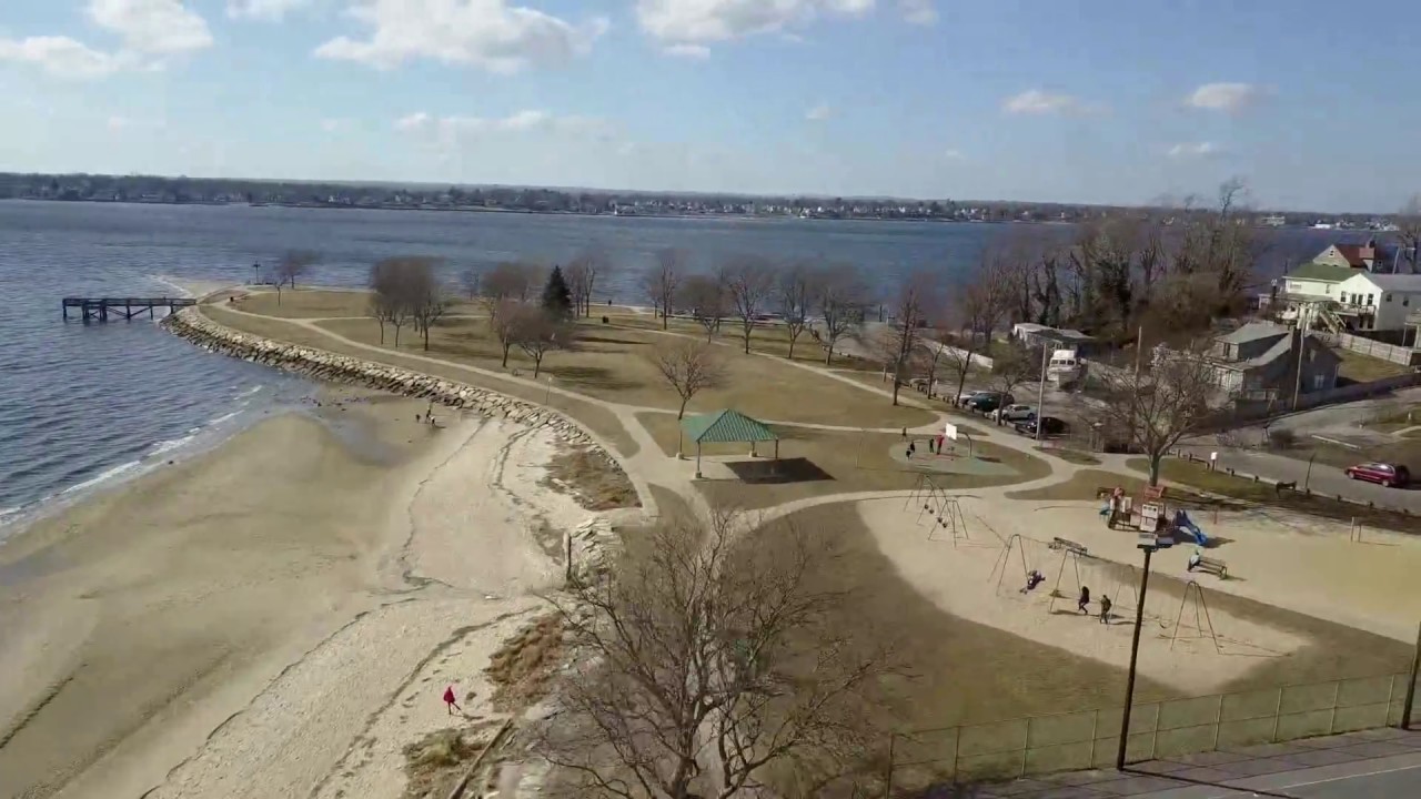 Sabin Point Park beach launch with boat chase and anchored catamaran ...