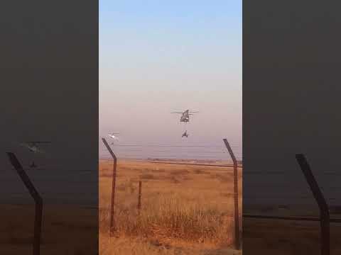 Chinook helicopter with ground AD gun #helicopter #airforce