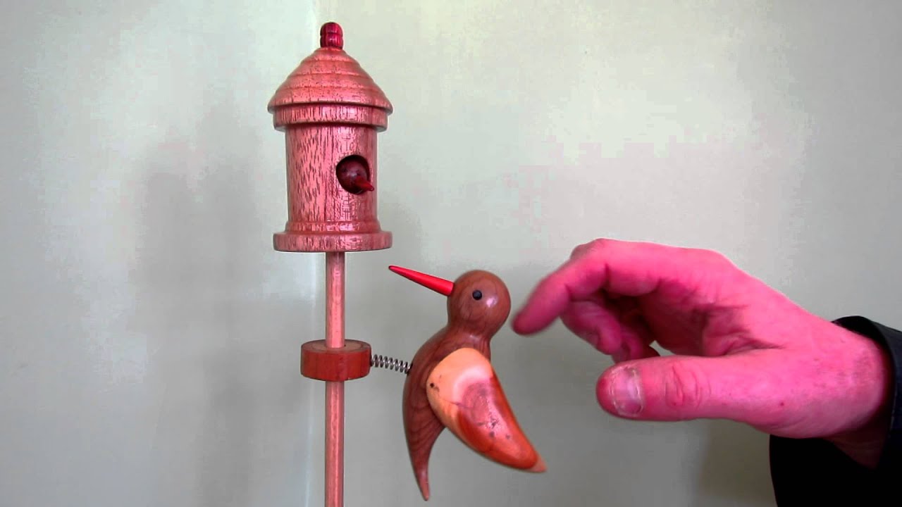 Humming bird wooden toy - YouTube