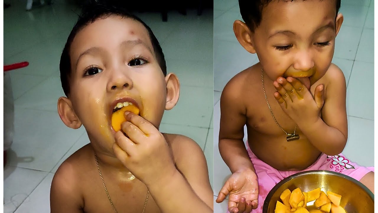 baby eating mango for the first time 2023।cute baby eating video - YouTube