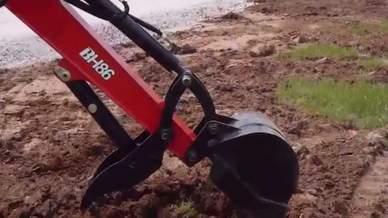 360 degree view of Branson 4520C with backhoe - YouTube