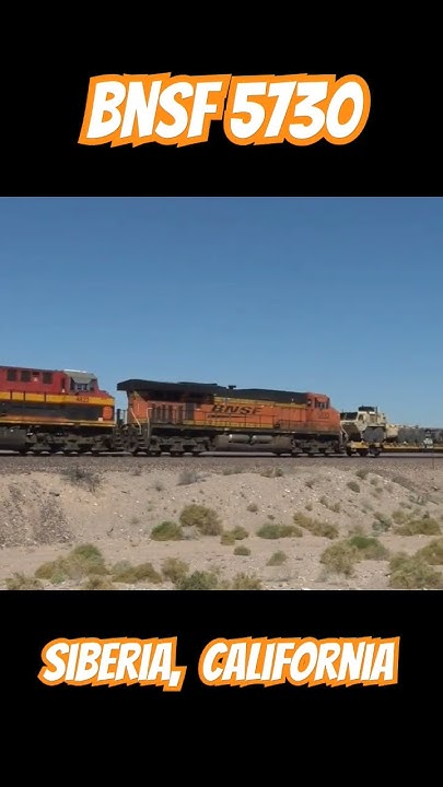 BNSF 5730 leads a military train at Siberia - YouTube