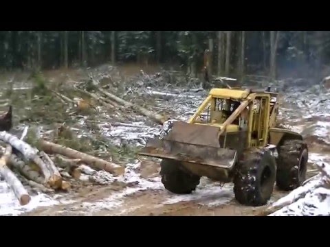 Logging site- skidder working - YouTube