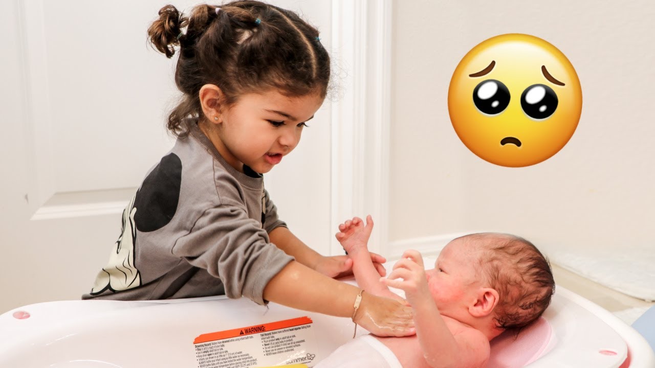 Toddler Gives Newborn Baby His First Bath!!! (adorable) - YouTube
