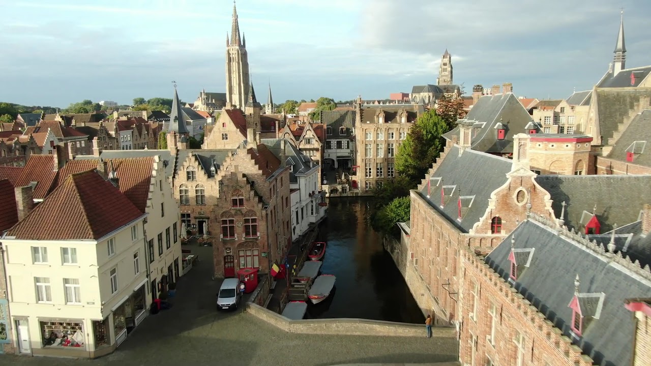 Brugge aerial view flying over canal. ( Copyright ) - YouTube