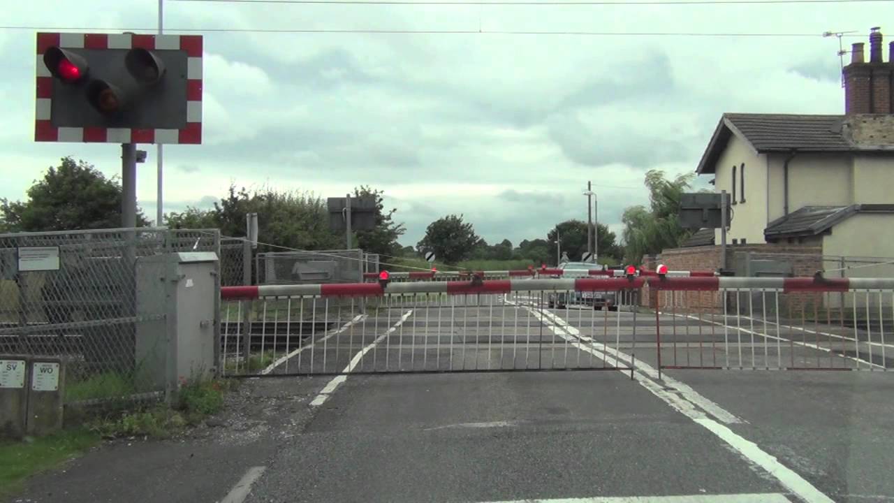 Sutton Level Crossing - YouTube