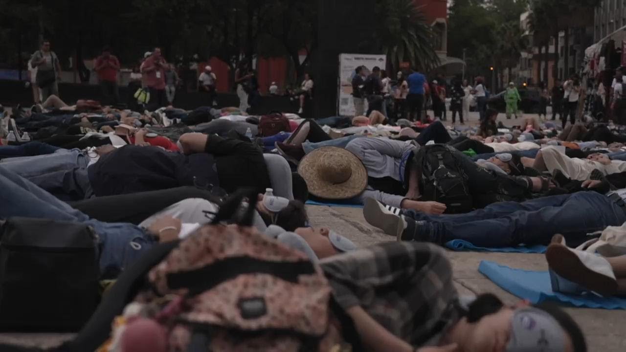 Hundreds of people in Mexico City stretch out for 'mass nap' to ...