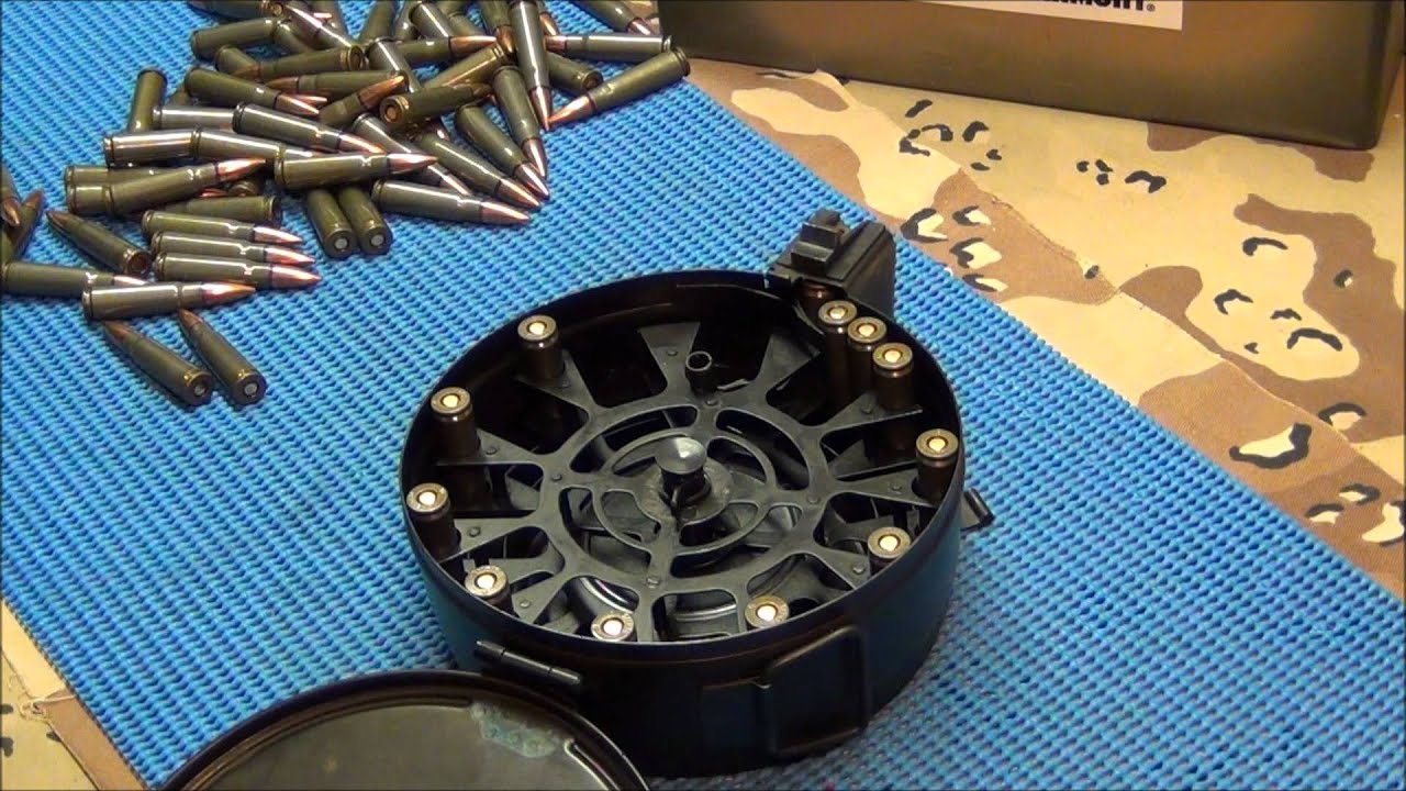 AK 47 loading a 75 rd drum. - YouTube