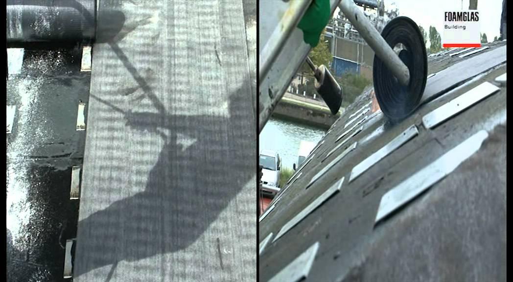 FOAMGLAS® slabs with hot bitumen on steel deck. Metal finishing on PC ...