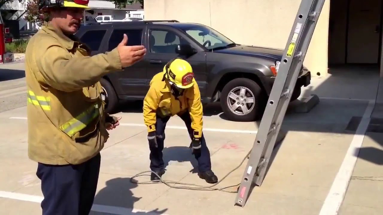 24' ladder 1 person high shoulder carry to a beam raise - YouTube