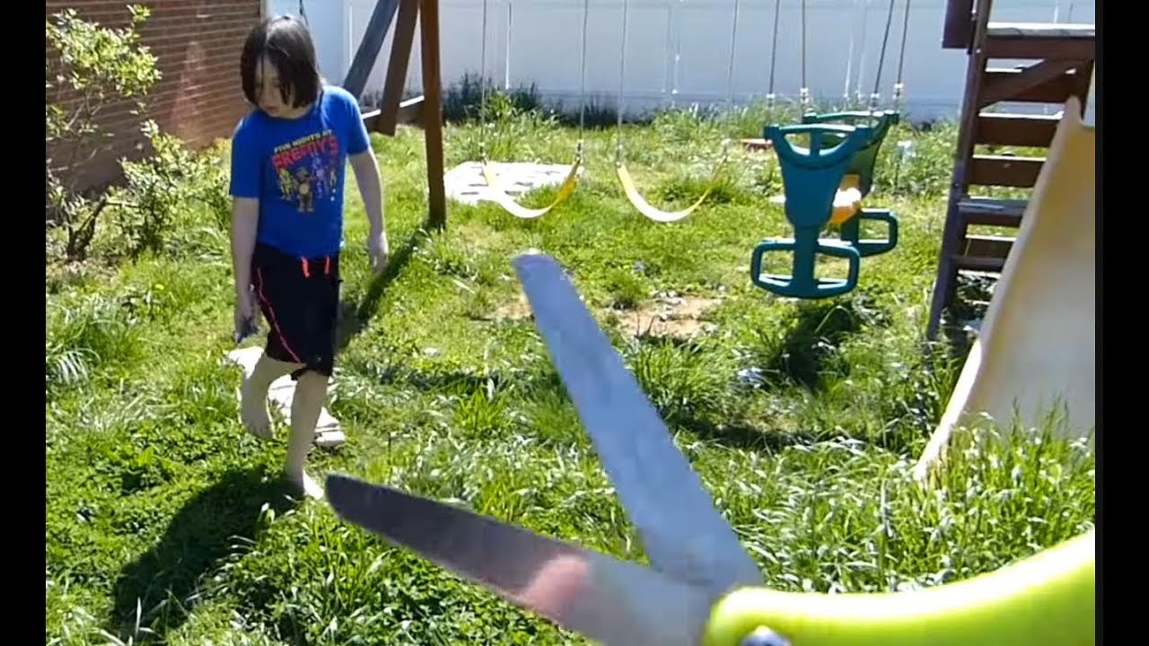 Cutting our grass with scissors! - YouTube