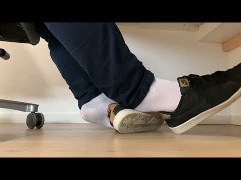 Black nikes and white socks shoeplay at work