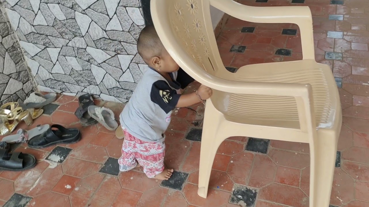 kid pushing chair - YouTube