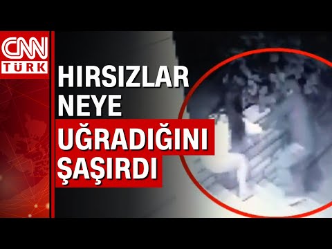 Genç kız elinde silah olan hırsıza geçit vermedi