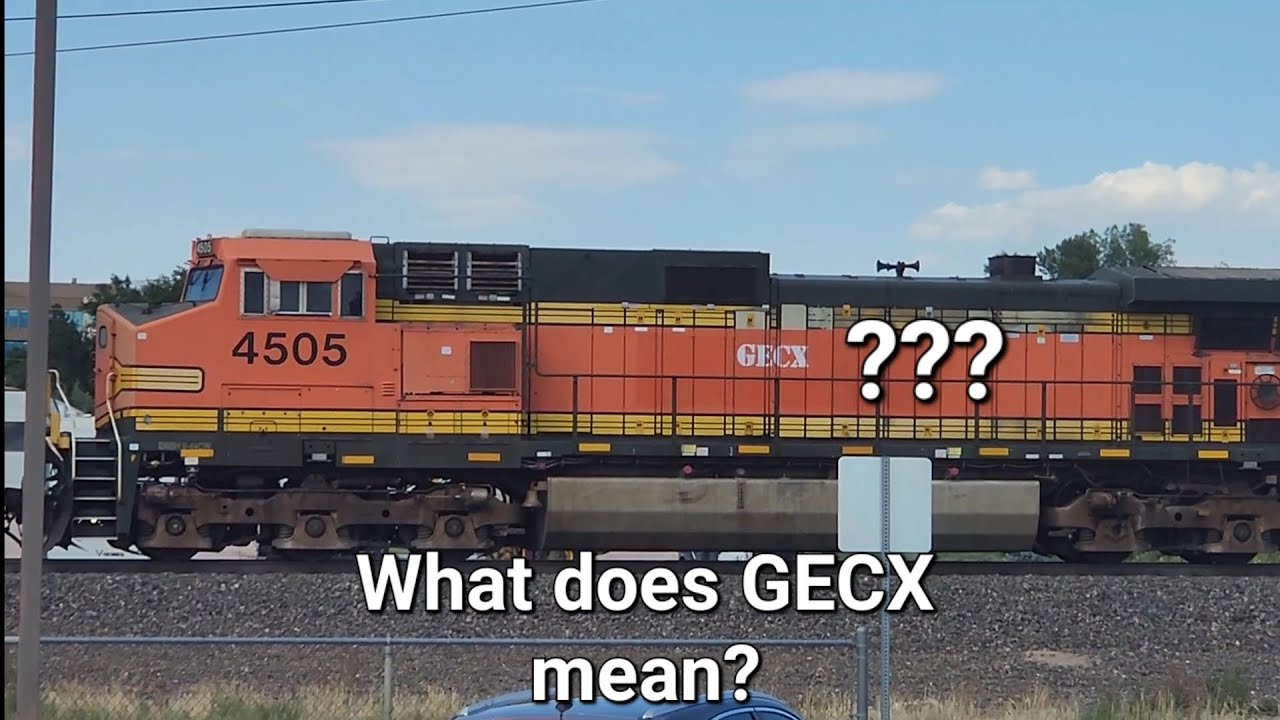 BNSF autorack train with a GE Dash 9 named "GECX" - YouTube