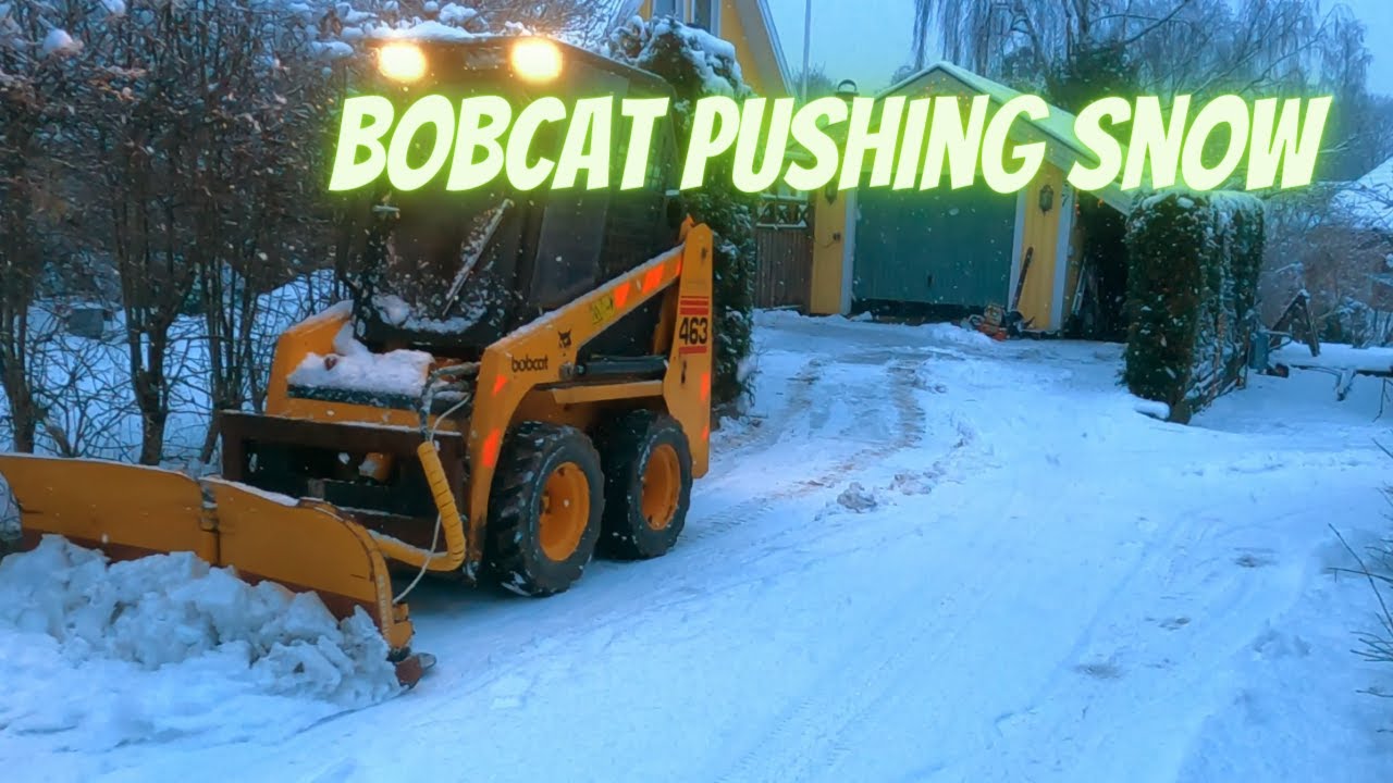 Bobcat plowing snow with V-Plow - YouTube