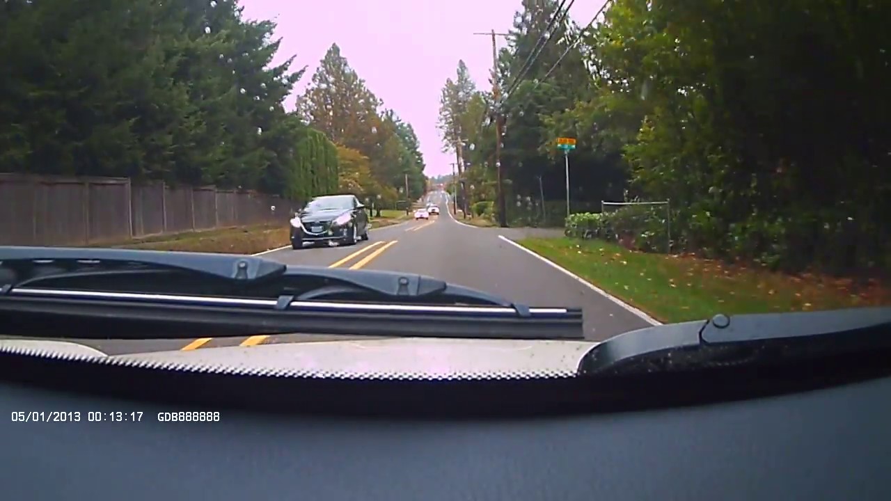 distracted driving crossing center line - YouTube